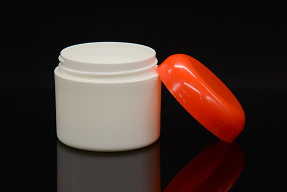 Round 50ml plastic bottle Small Cosmetic Jars with orange cap For Lotions