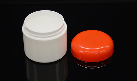 Round 50ml plastic bottle Small Cosmetic Jars with orange cap For Lotions