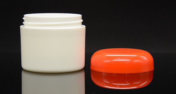 Round 50ml plastic bottle Small Cosmetic Jars with orange cap For Lotions
