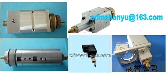 rotating head for drilling EDM